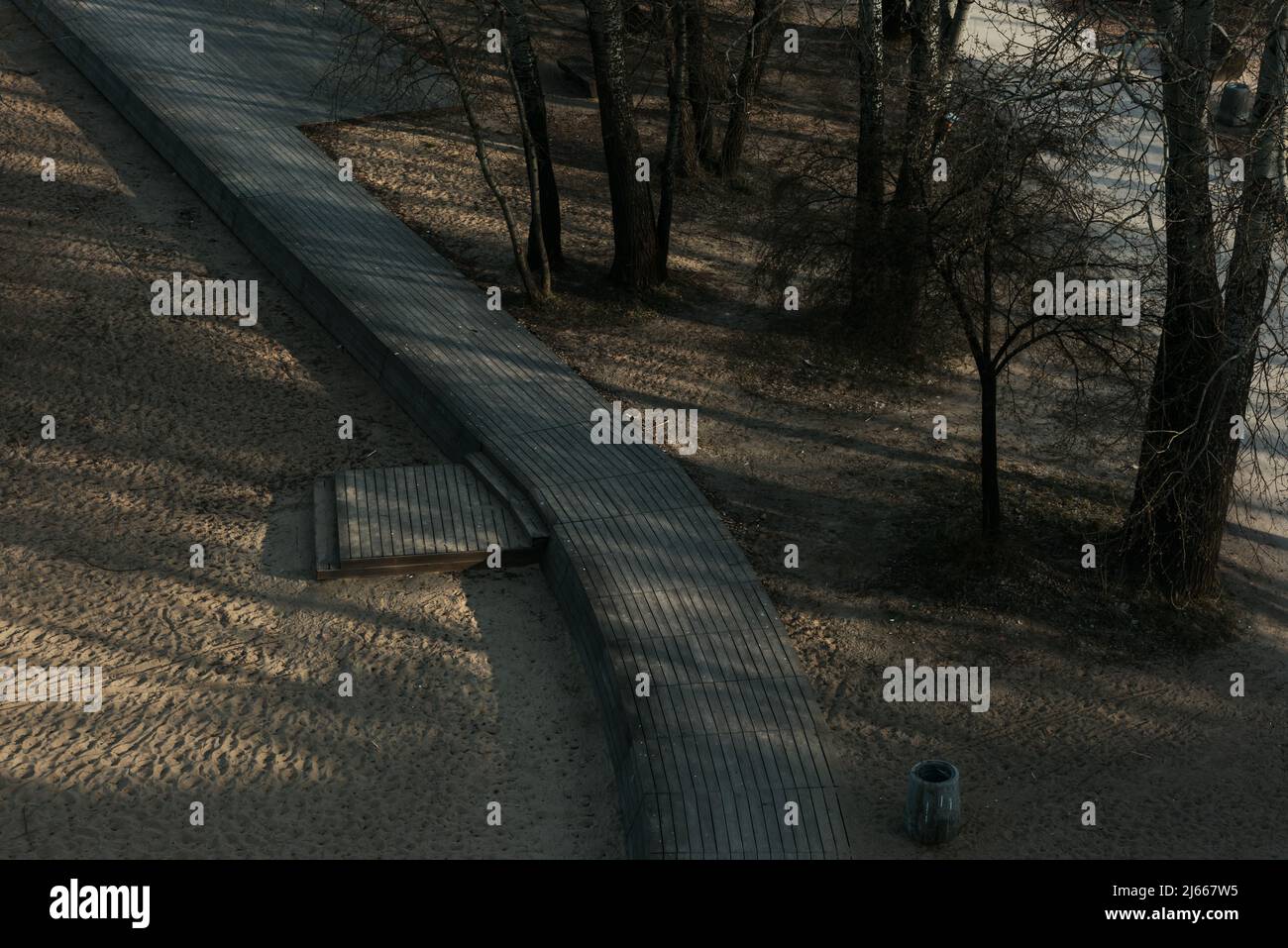 Wooden path with a platform and a ladder in the park Stock Photo - Alamy