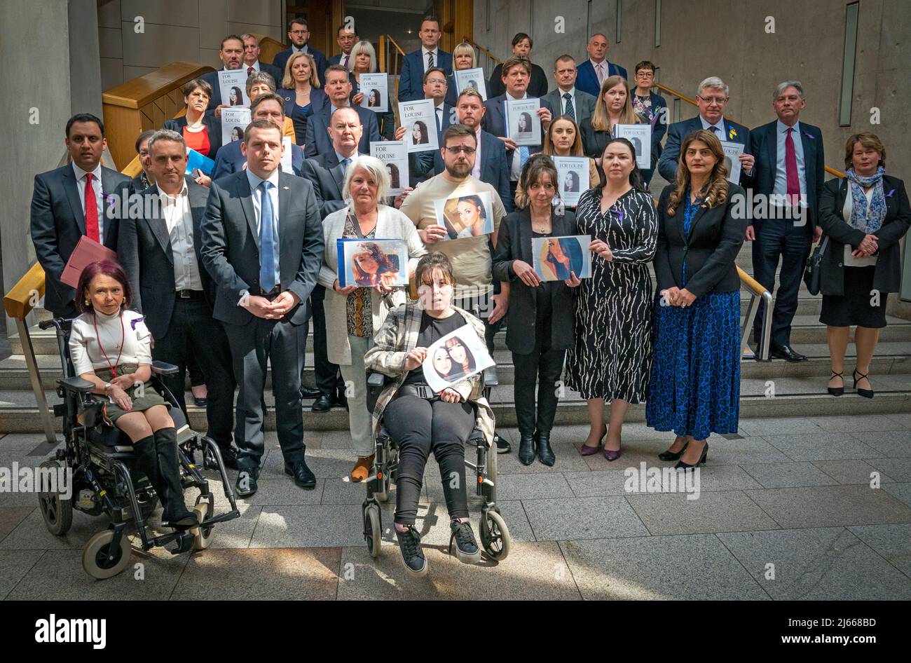Caroline Lyon, from East Kilbride, (front, third from right) holds a ...