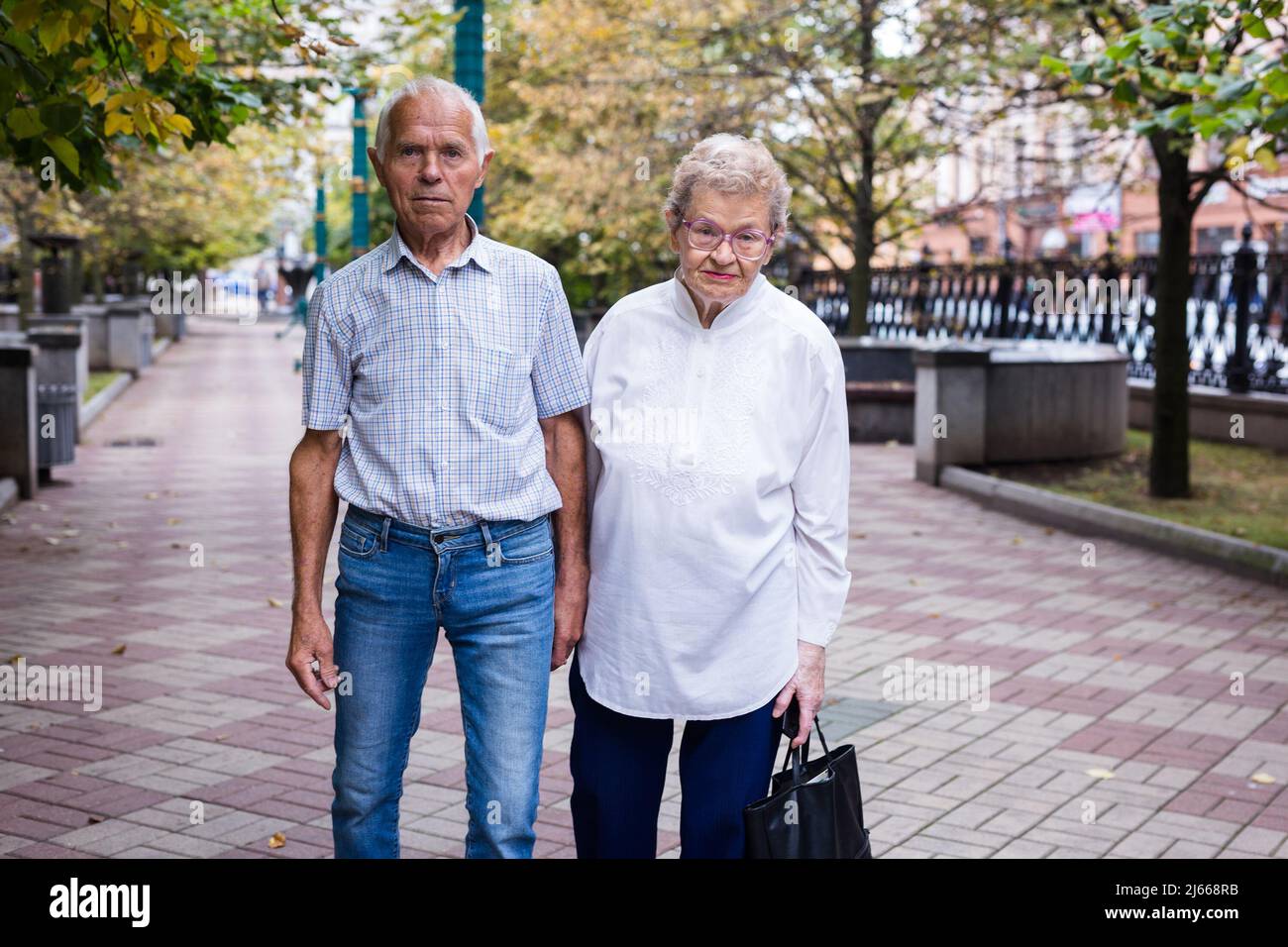 Two lovers strolling in beautiful hi-res stock photography and images ...