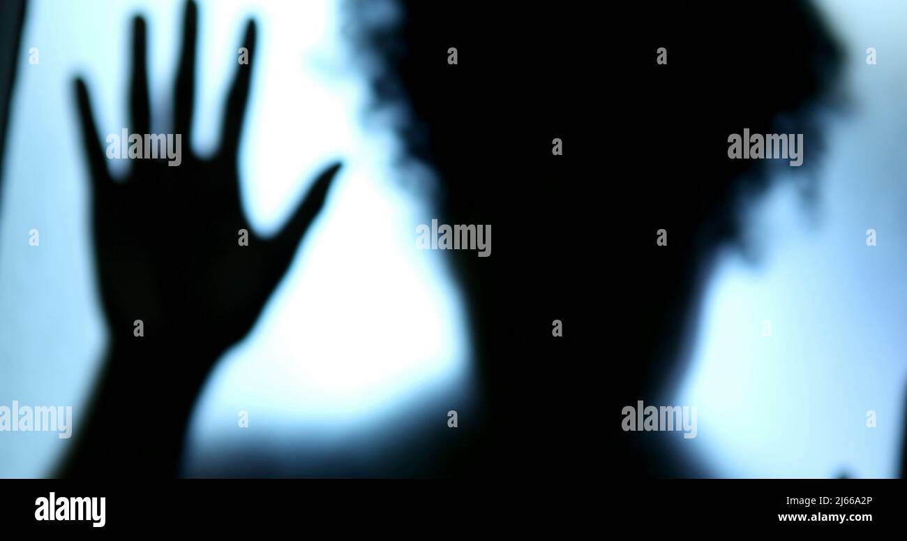 Depression concept, shadow of woman trapped behind glass Stock Photo ...