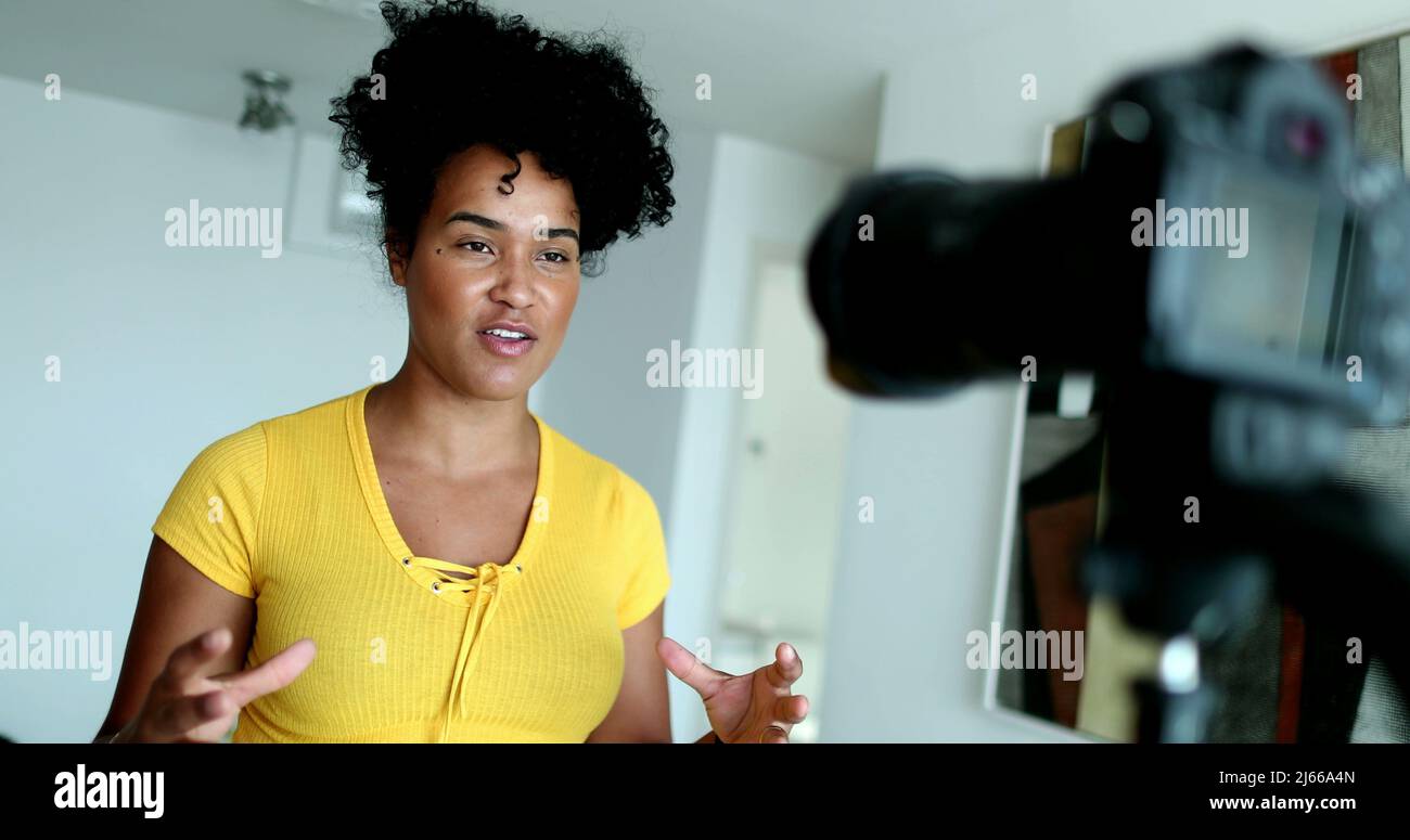 Female vlogger speaking at camera from home Stock Photo - Alamy