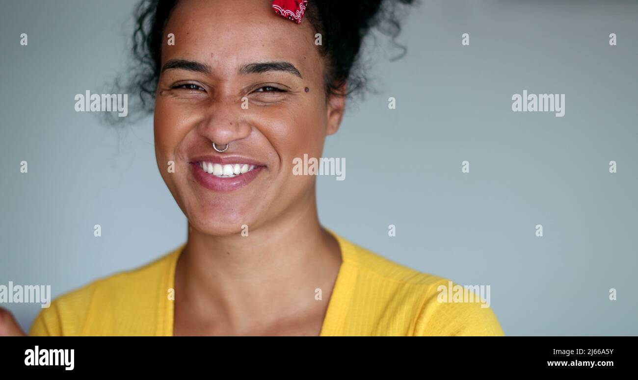 Natural young woman authentic real life laugh and smile portrait face ...