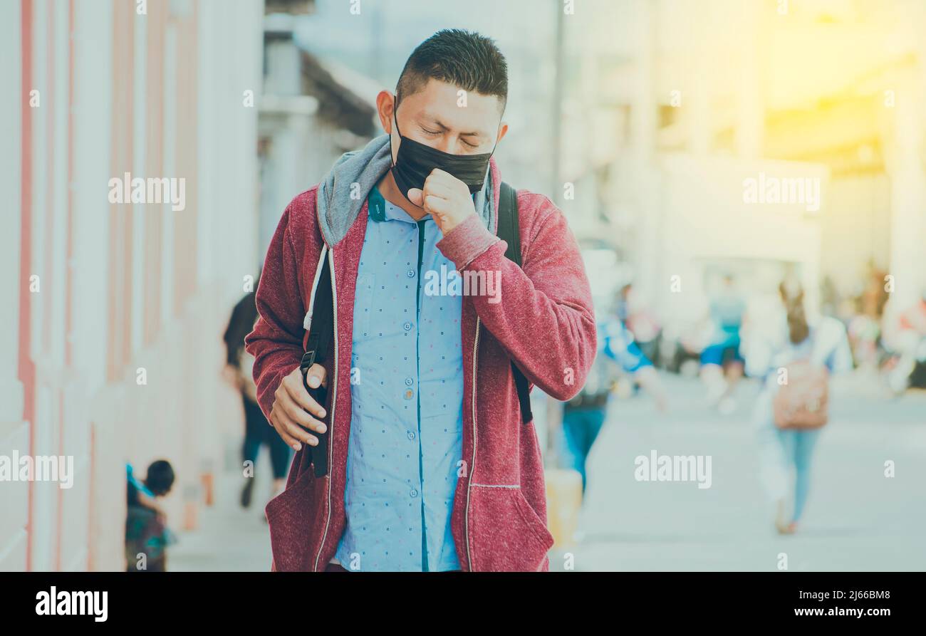 Coughing man with surgical mask, man with mask coughing in the street ...