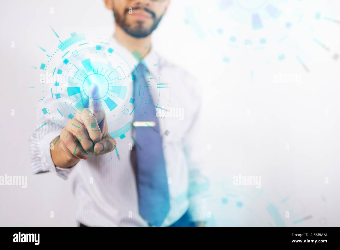 Businessman touching holographic icons, man selecting technology icons ...