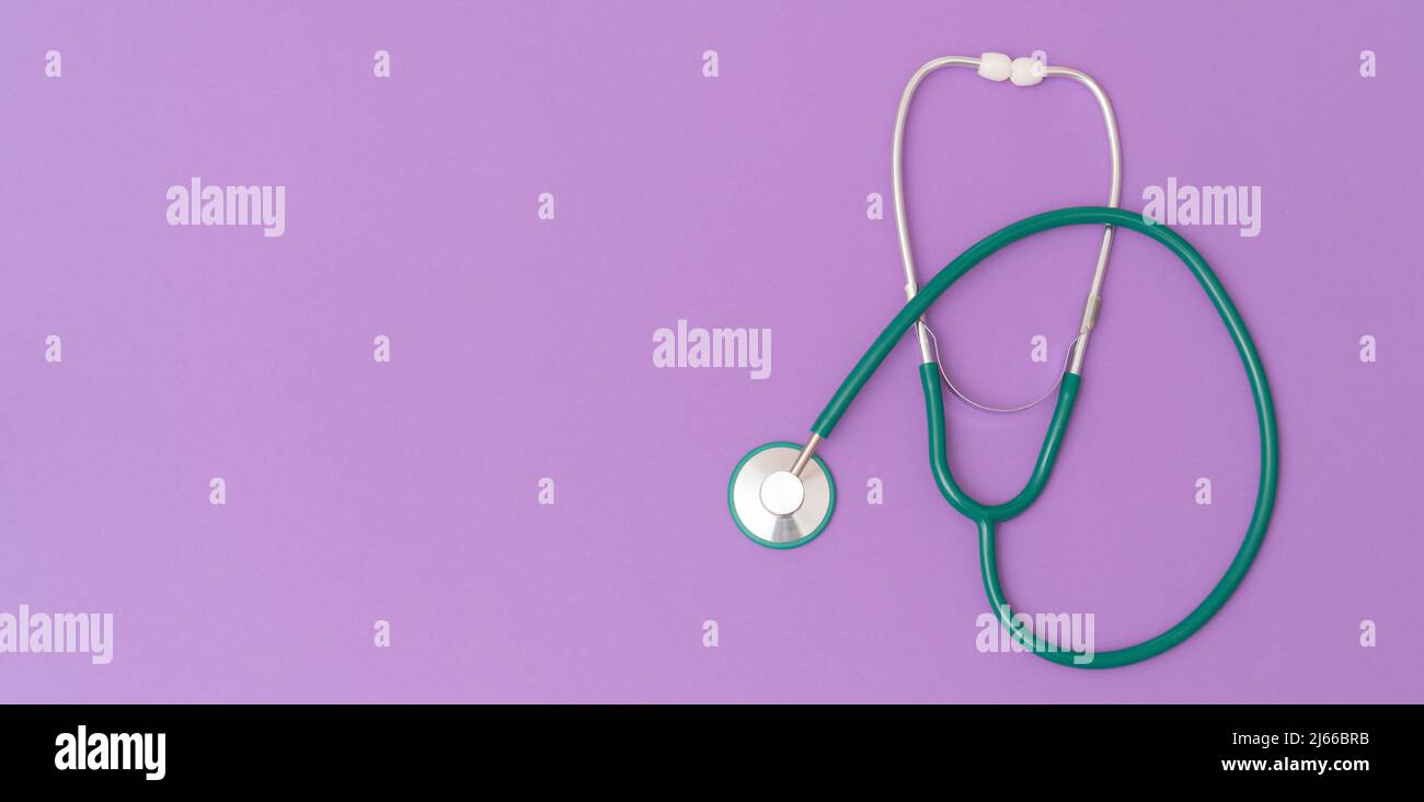 Medical stethoscope on color background with place for text. Abstract ...