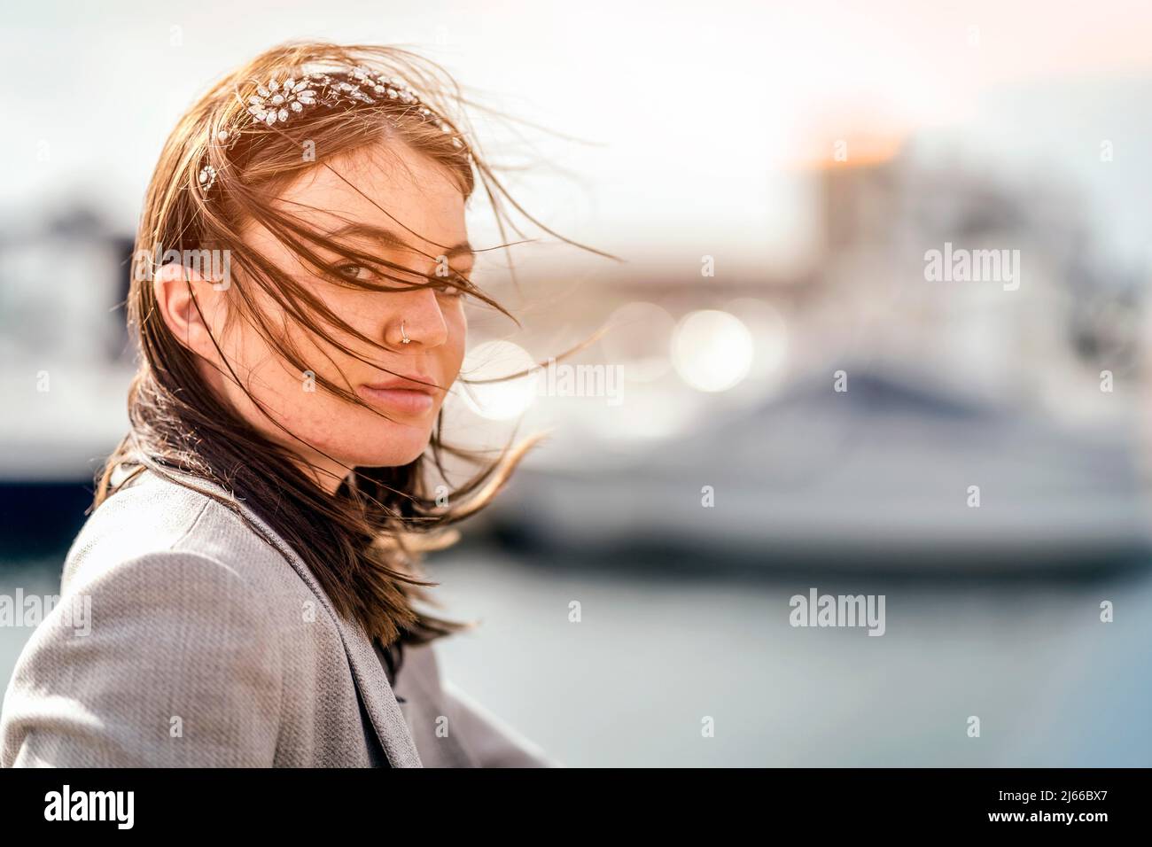 A portrait of an attractive young woman during windy weather Stock ...