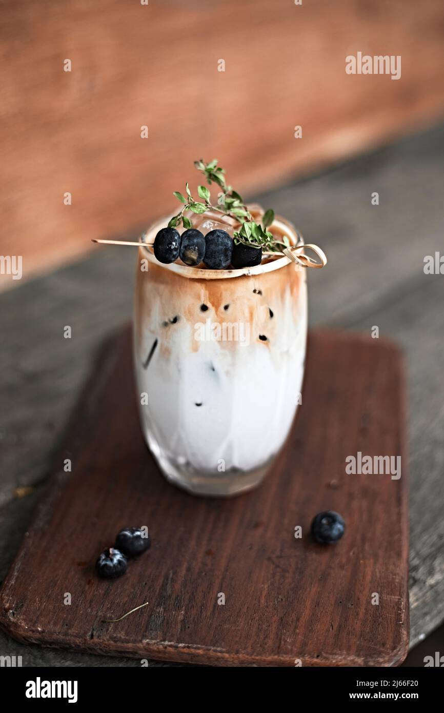 iced latte coffee in a glass with cold milk Stock Photo - Alamy