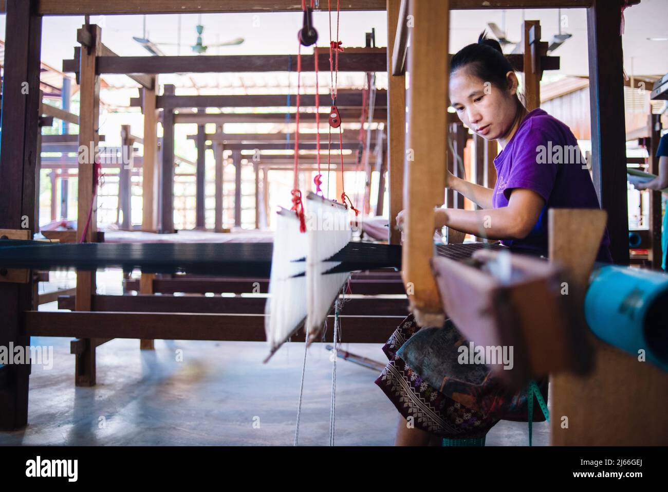 Silk weaving process at the Mai Savanh Lao workshop in Vientiane, Laos Stock Photo - Alamy
