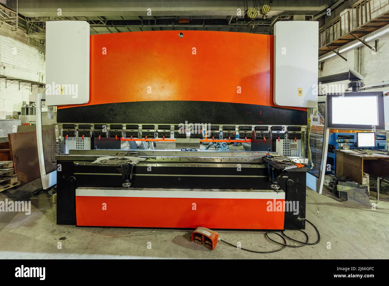 Hydraulic bending machine with CNC in metalworking workshop Stock Photo ...