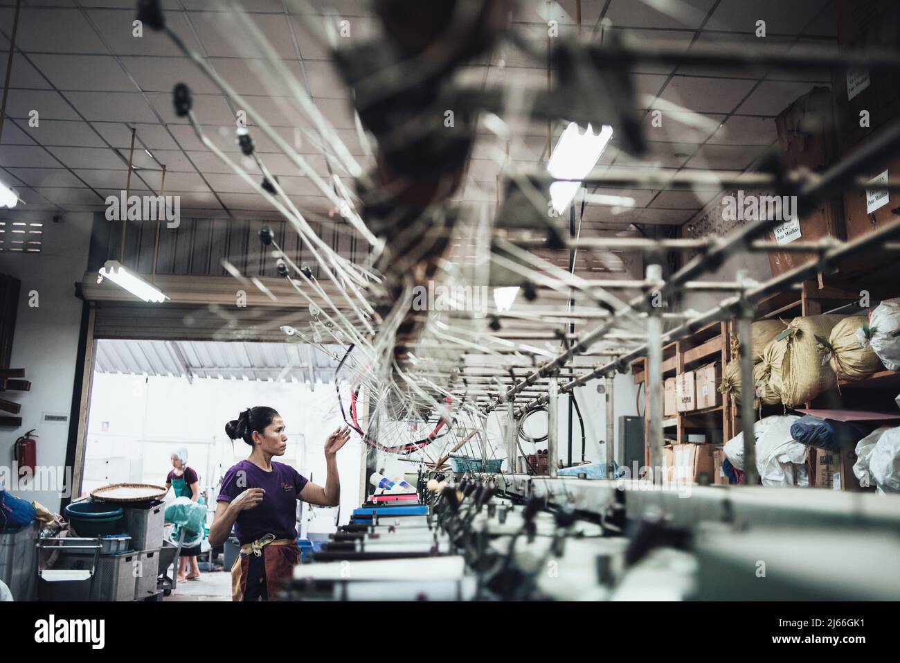 Silk weaving process at the Mai Savanh Lao workshop in Vientiane, Laos ...