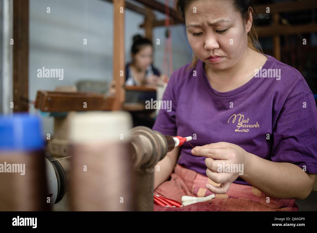 Working women in vientiane hi-res stock photography and images - Alamy