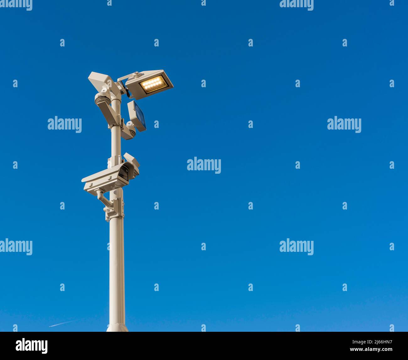 Light pole with surveillance camera, Berlin, Germany Stock Photo - Alamy