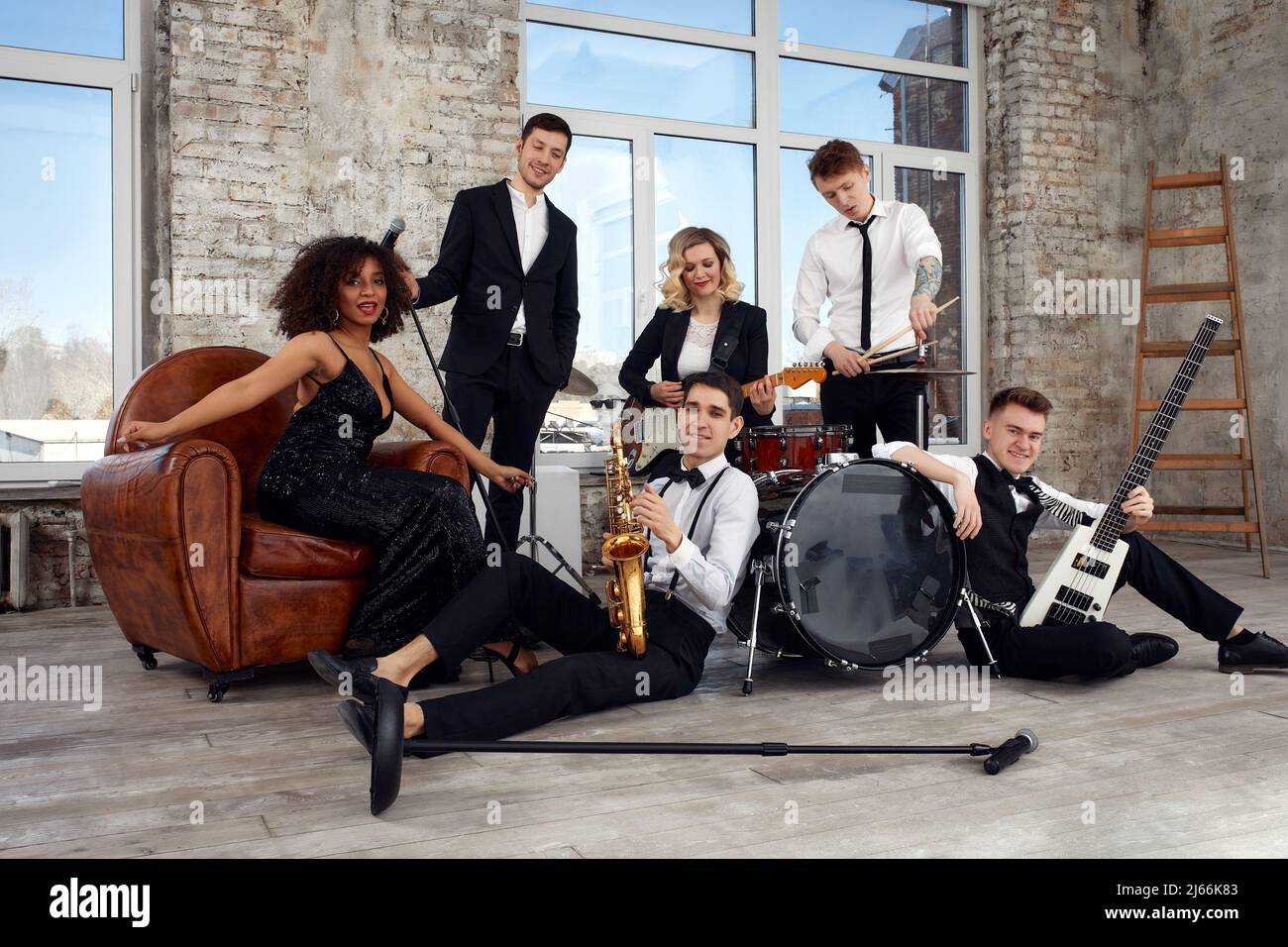 Young international musicians, a band performing on the loft stage. The ...