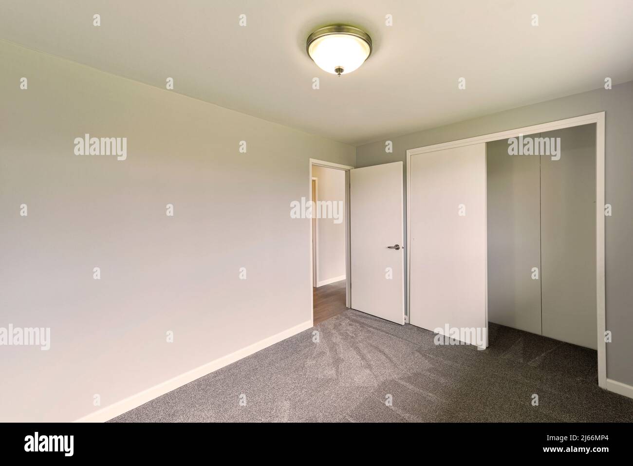Modern residential empty bedroom interior Stock Photo - Alamy