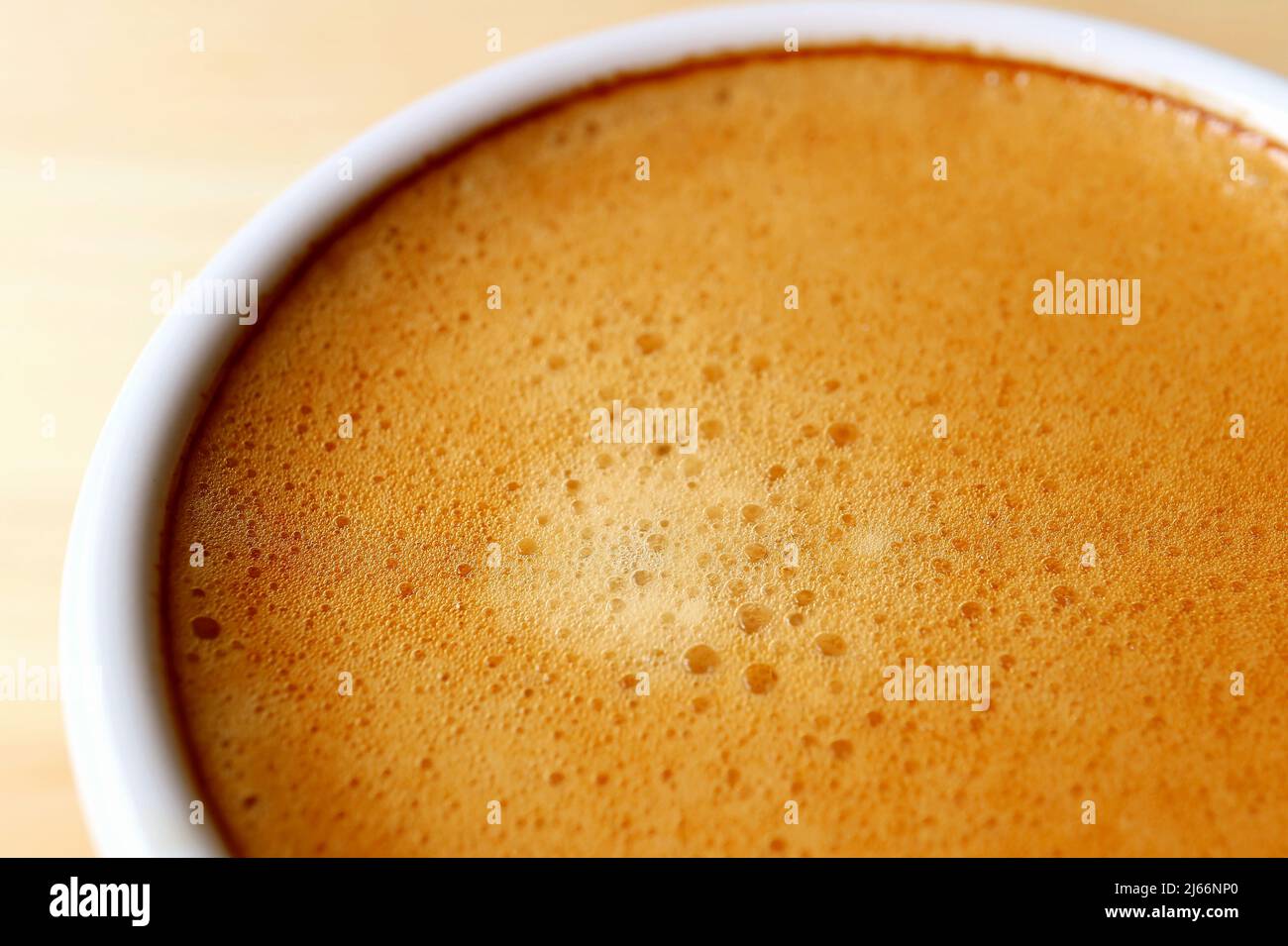 Closeup the texture of frothy hot coffee surface Stock Photo - Alamy