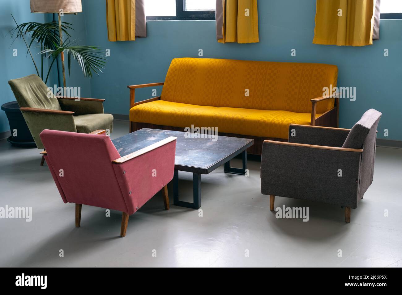 Tables and chairs in an empty cafe, office, coworking or room. A closed ...