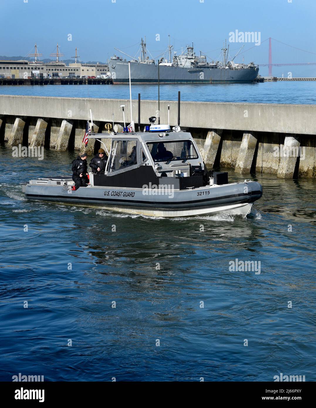 Members of the U.S. Coast Guard patrol the waters off San Francisco in ...