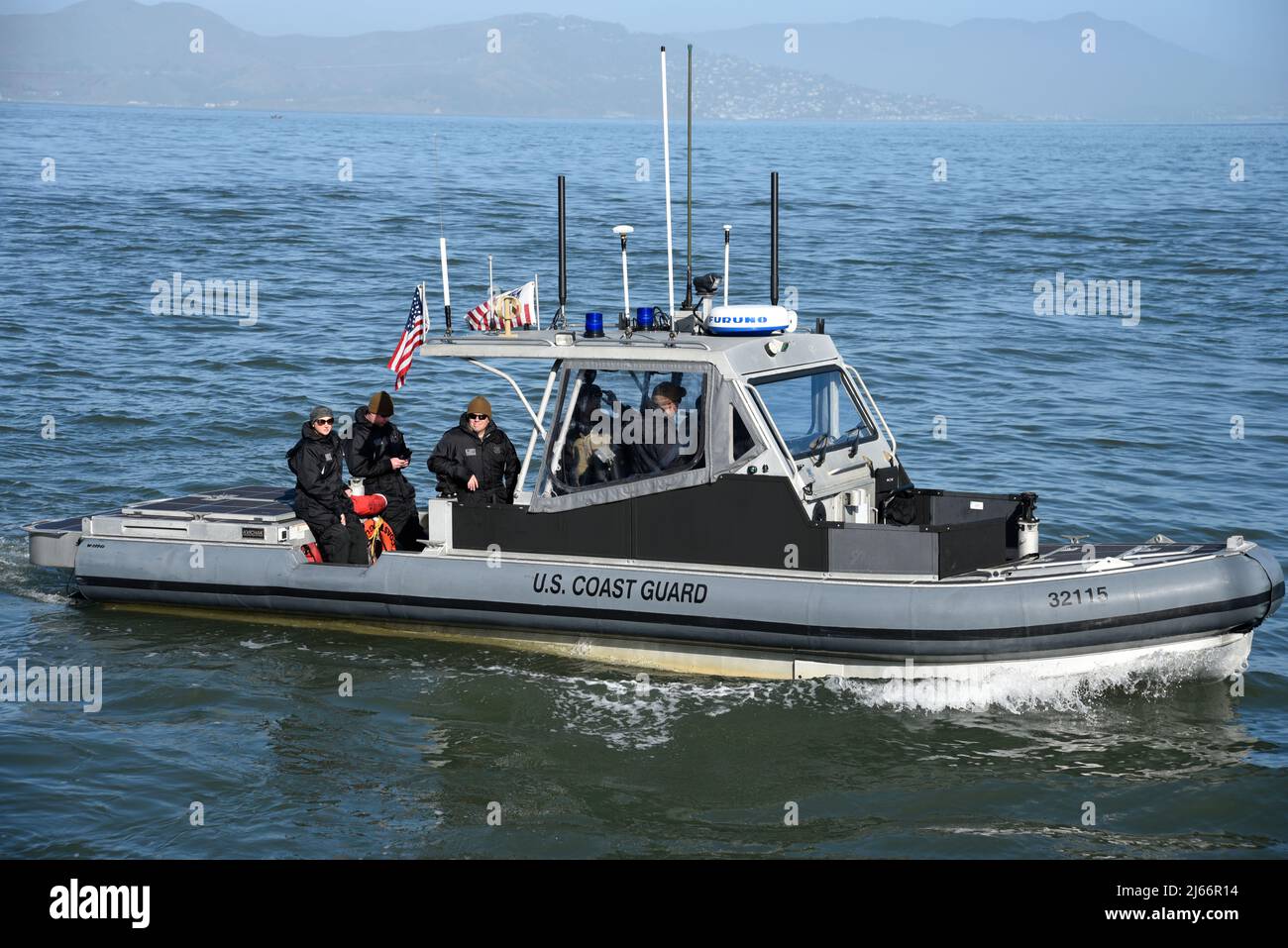 Members of the U.S. Coast Guard patrol the waters off San Francisco in ...