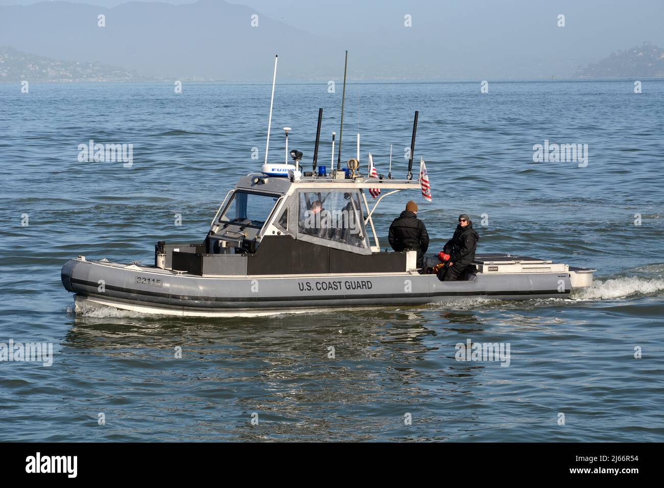 Members of the U.S. Coast Guard patrol the waters off San Francisco in ...