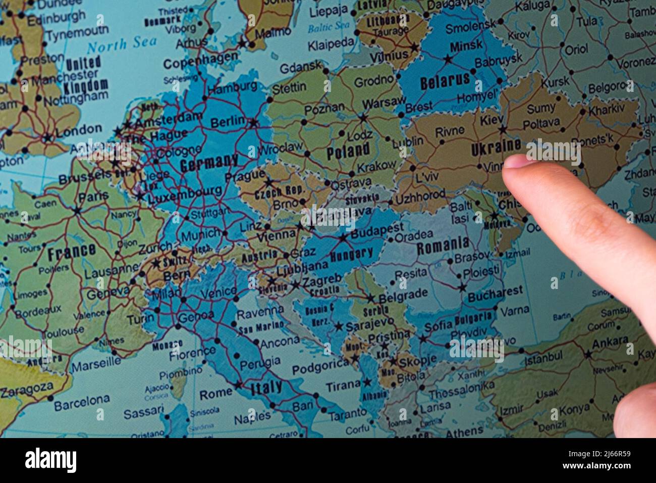 Finger pointing on map hi-res stock photography and images - Alamy