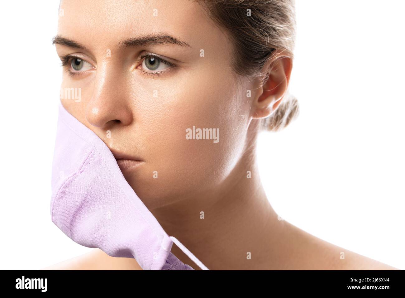 Maskne - acne breakouts from wearing a face mask Stock Photo - Alamy