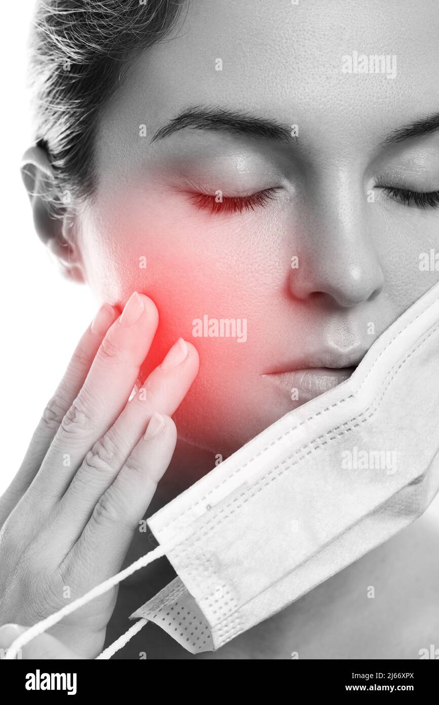 Maskne - acne breakouts from wearing a face mask Stock Photo - Alamy