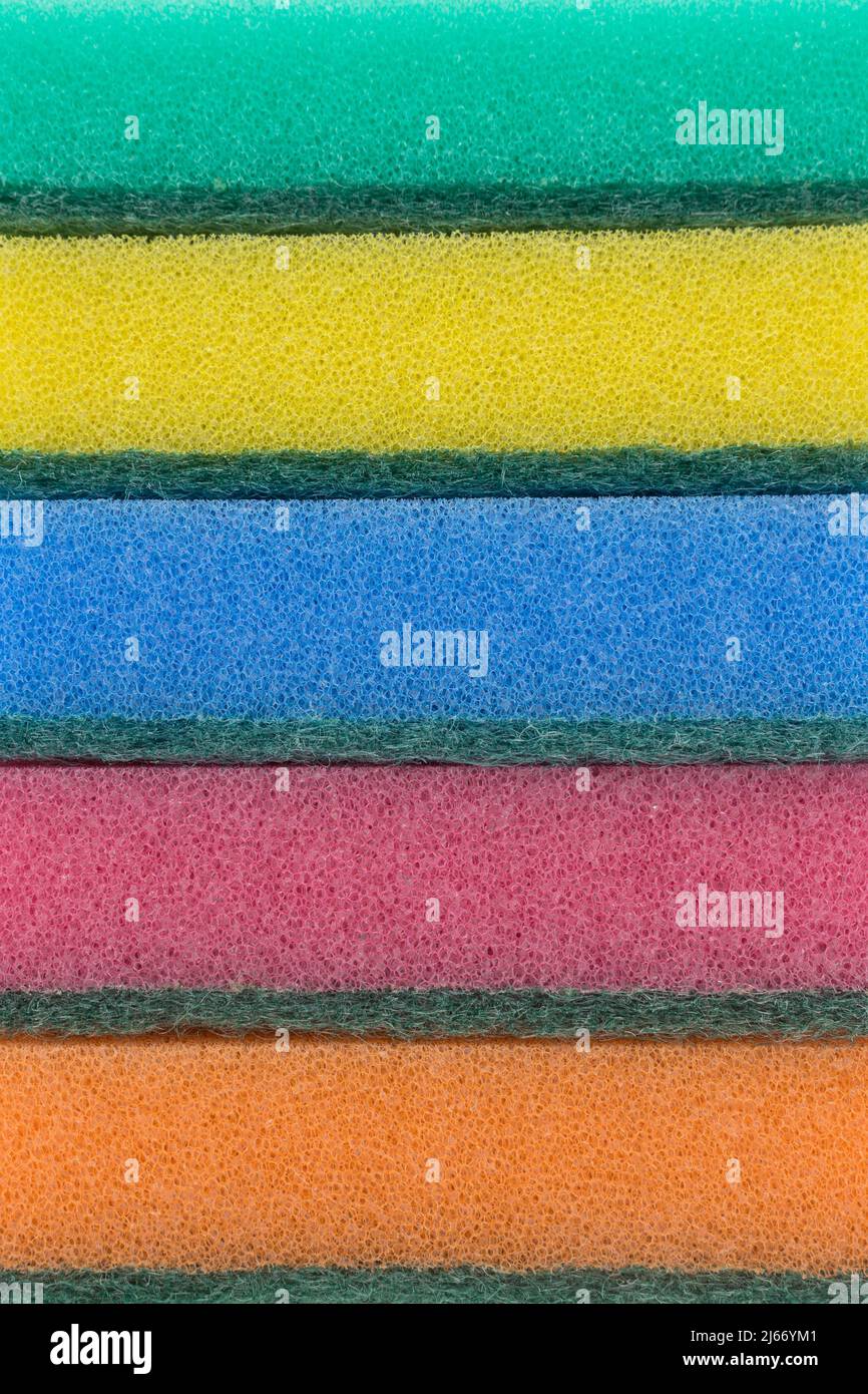 Multi-colored sponges for household work from foam rubber, stack, on a ...