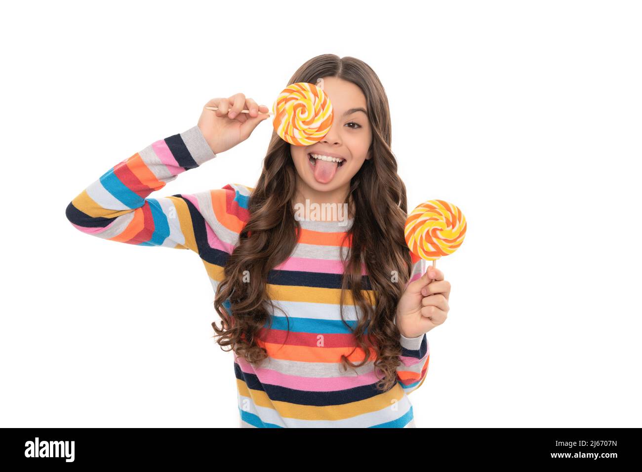 making faces. happy girl hold lollipop isolated on white. lollipop ...