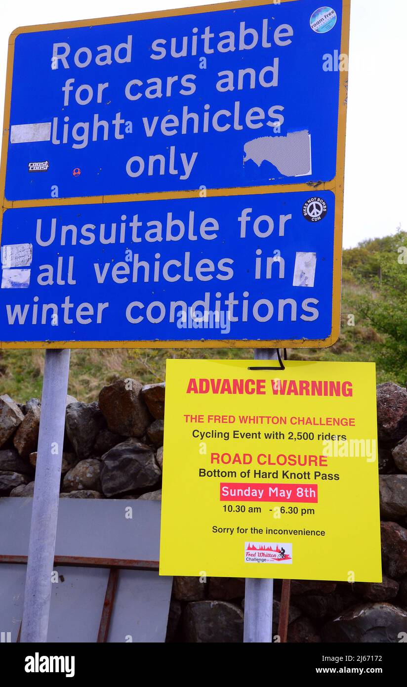 Warning road sign and a road closure notice to inform users of ...