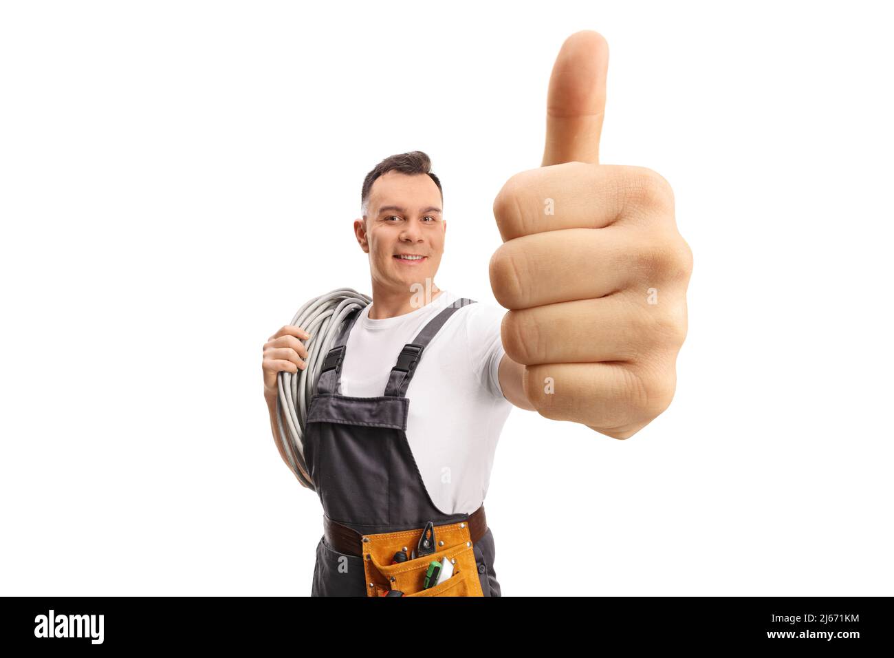 Electrician carrying cables on his shoulder and showing thumbs up ...