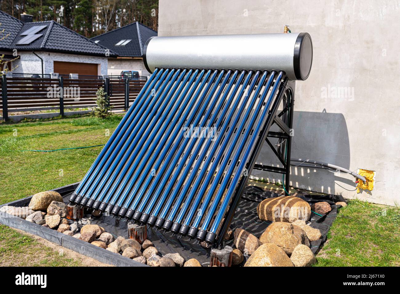 A modern solar pressure collector to heat domestic hot water, standing ...