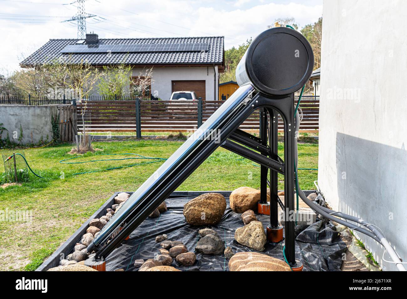 A modern solar pressure collector to heat domestic hot water, standing ...