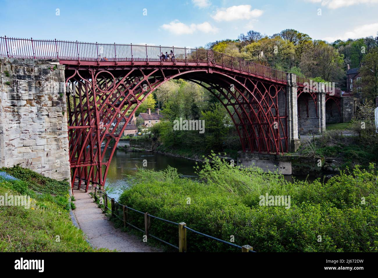 The Iron Bridge is a cast iron arch bridge that crosses the River ...