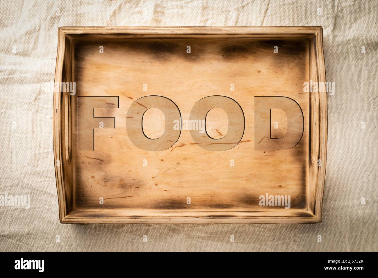 Empty wooden serving box with handles with the inscription FOOD. Food ...