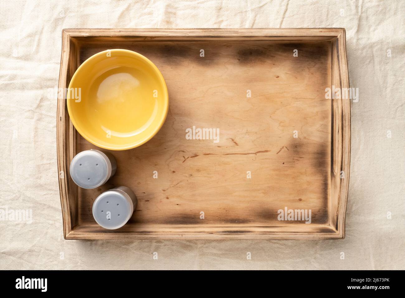 Empty dinner bowls in a wooden serving box. Food and catering concept ...