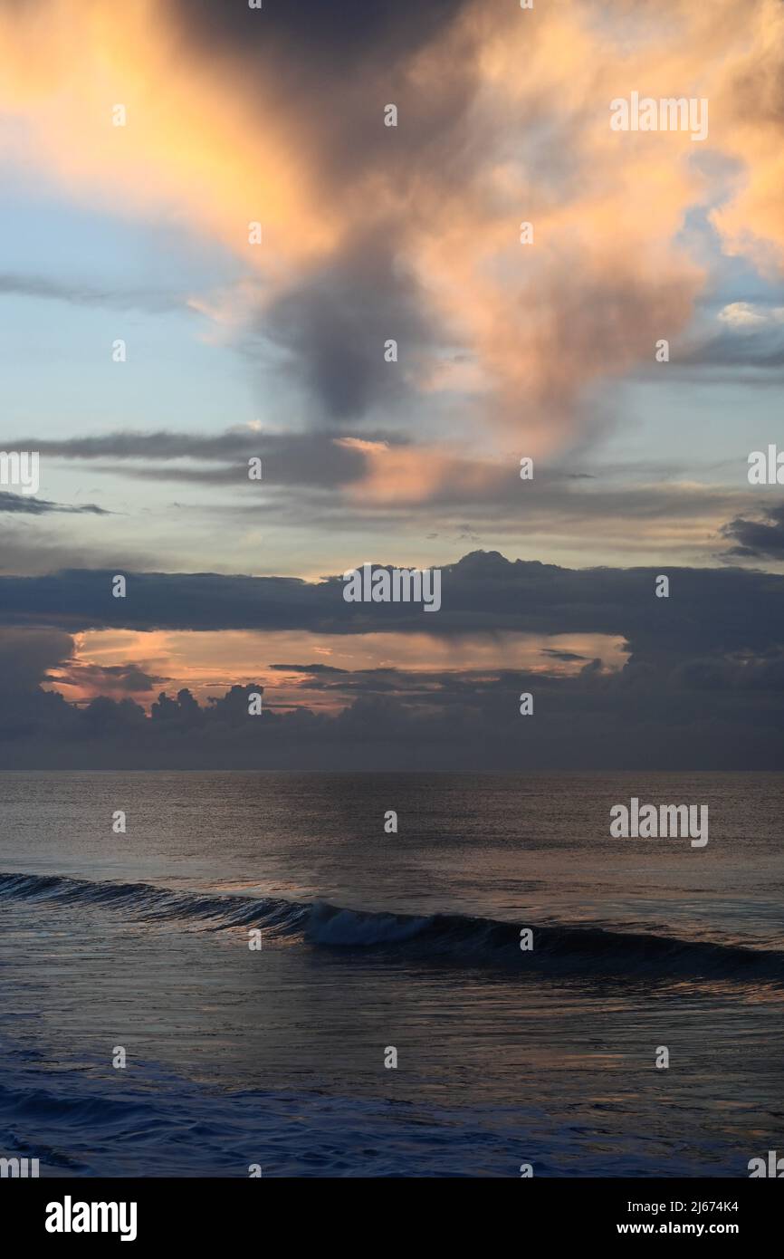 Dark and mysterious sunset above the ocean Stock Photo - Alamy