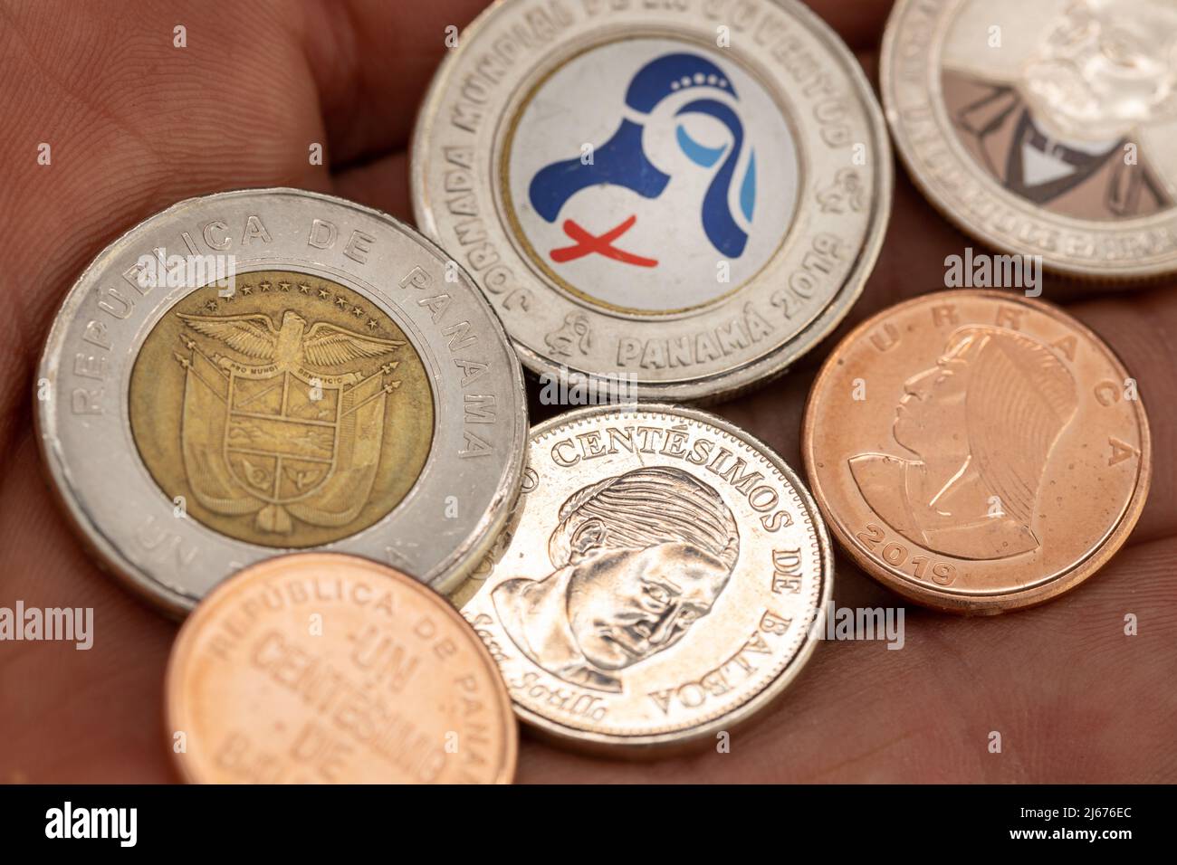 Panama money, Balboa coins lying on an outstretched hand, Financial ...