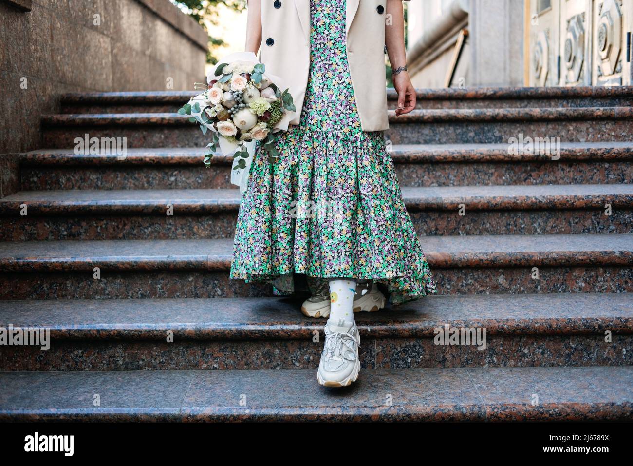 Contemporary modern trendy Hipster bride in informal dress and sneakers ...