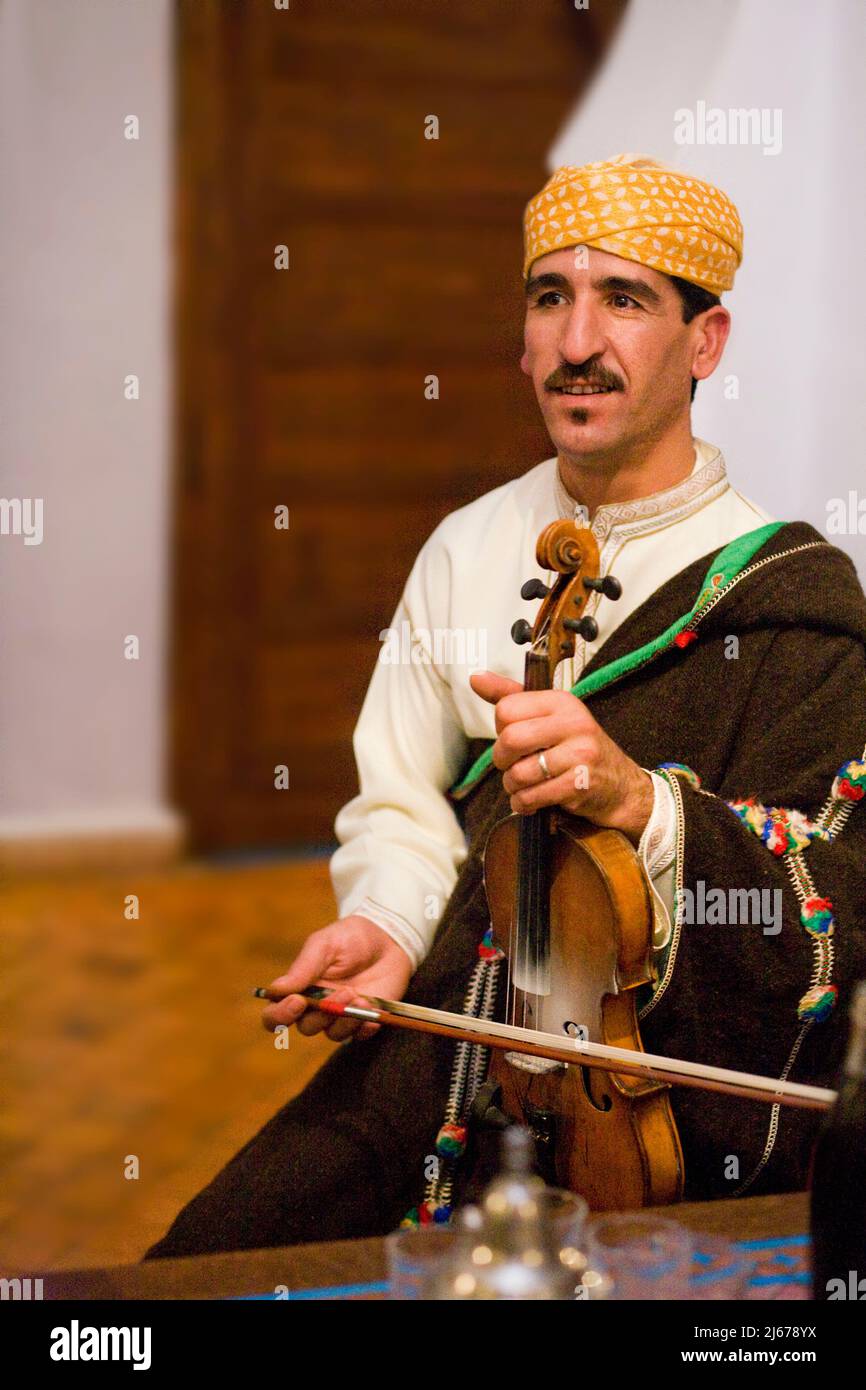 Musician plays violin Chefchaouen Morocco Stock Photo - Alamy