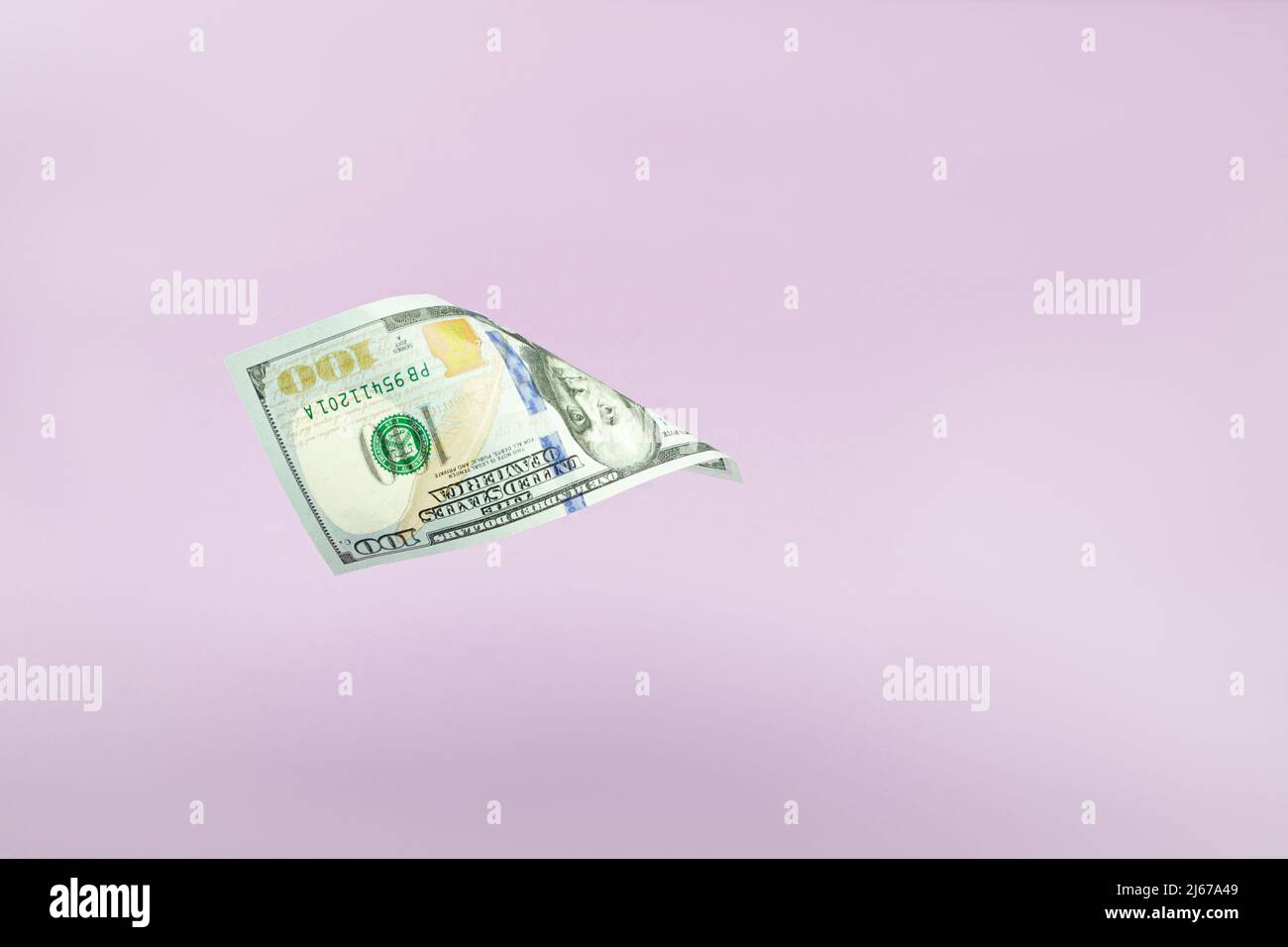 100 Dollar banknotes flying on pink background. Economy, savings and ...
