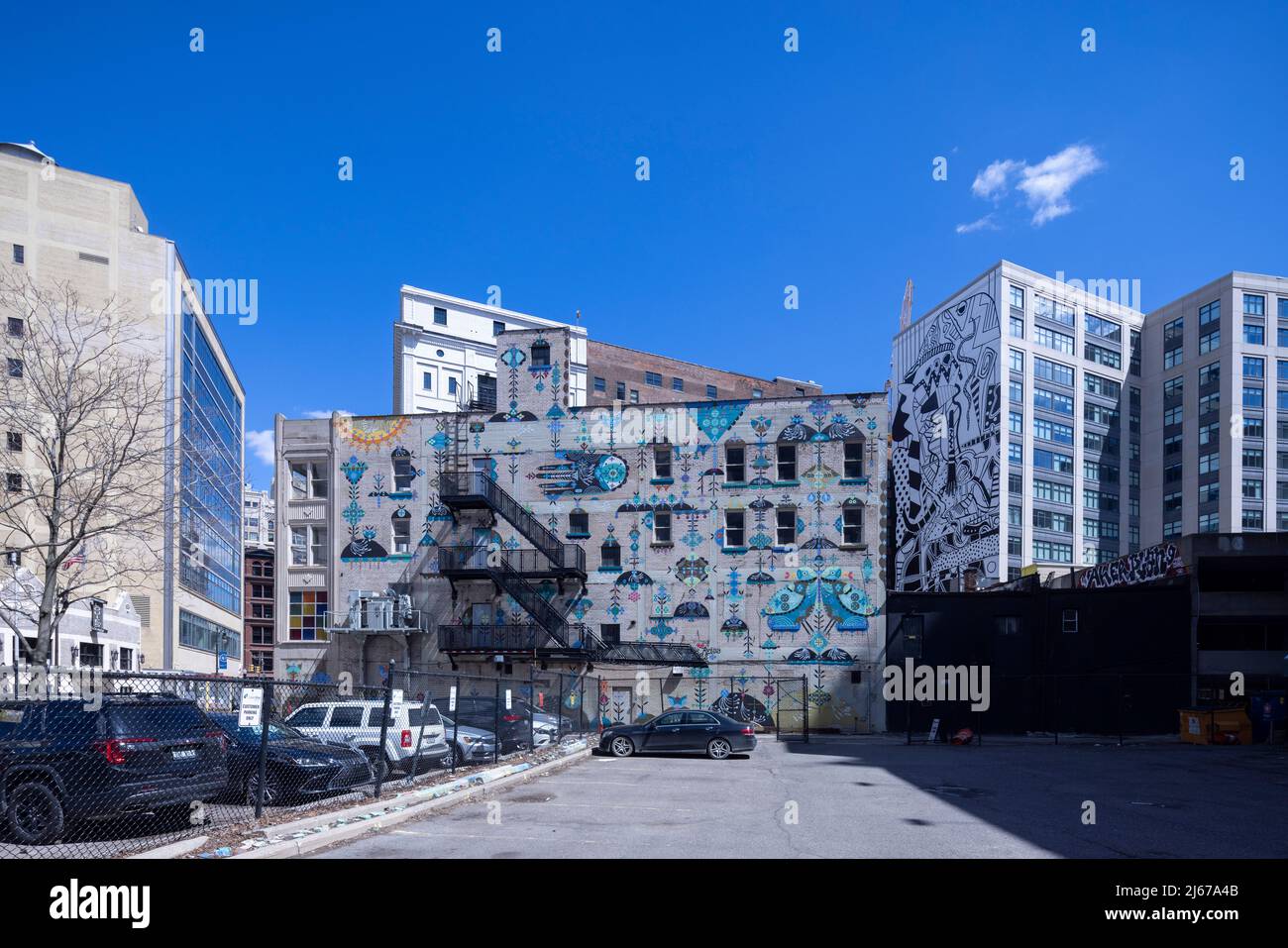 buildings with left "A Mural of Many Colors" by Bunnie Reiss, 2018 and ...