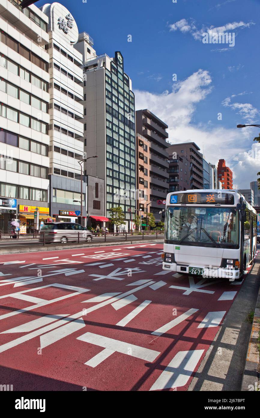 Bus on city street in Toranomon, Tokyo, Japan Stock Photo - Alamy