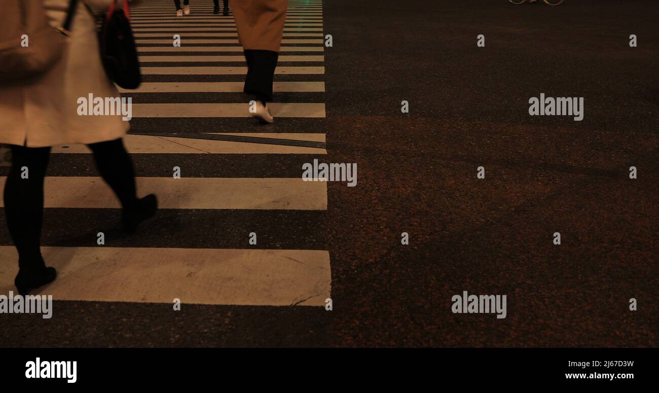 Walking people body parts crossing hi-res stock photography and images ...