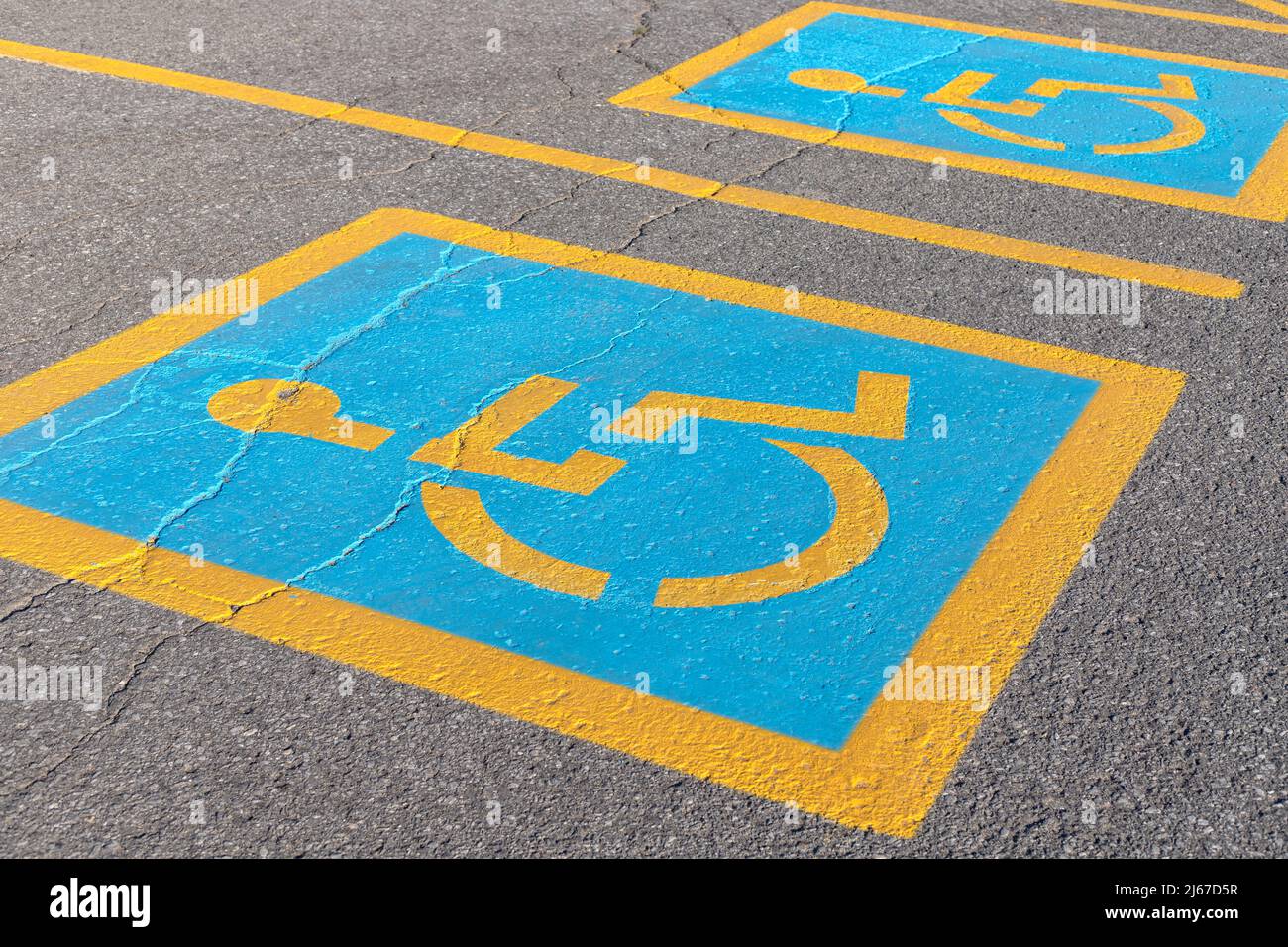 Parking space reserved for people with disabilities Stock Photo - Alamy
