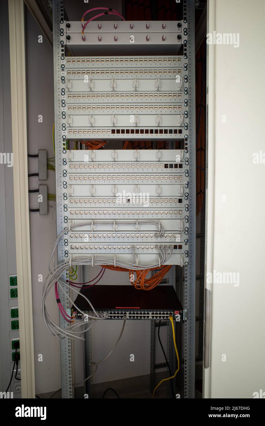 in a server cabinet are many patch panels and switches Stock Photo - Alamy