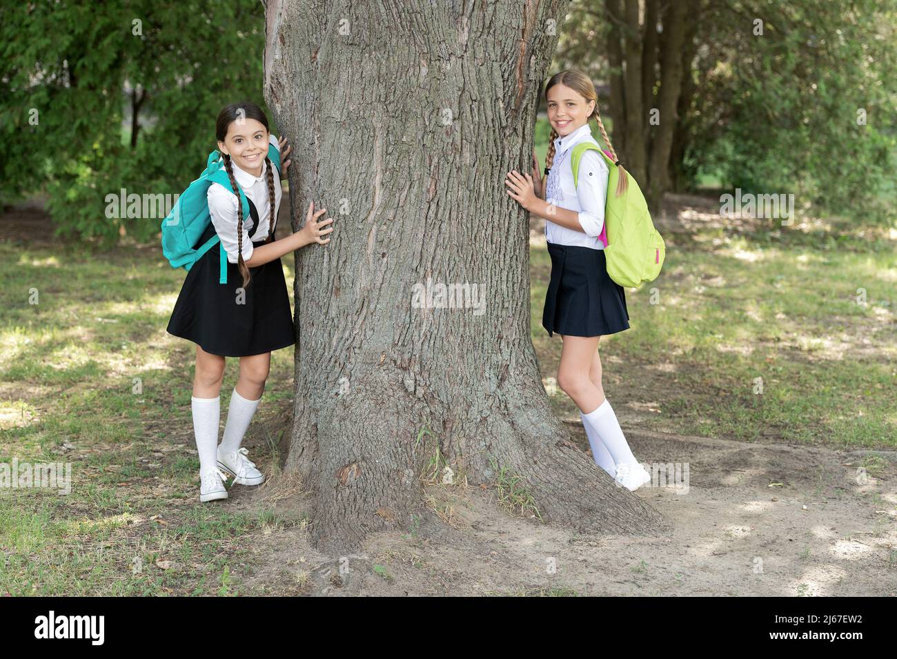 happy children having fun together in park after school Stock Photo - Alamy