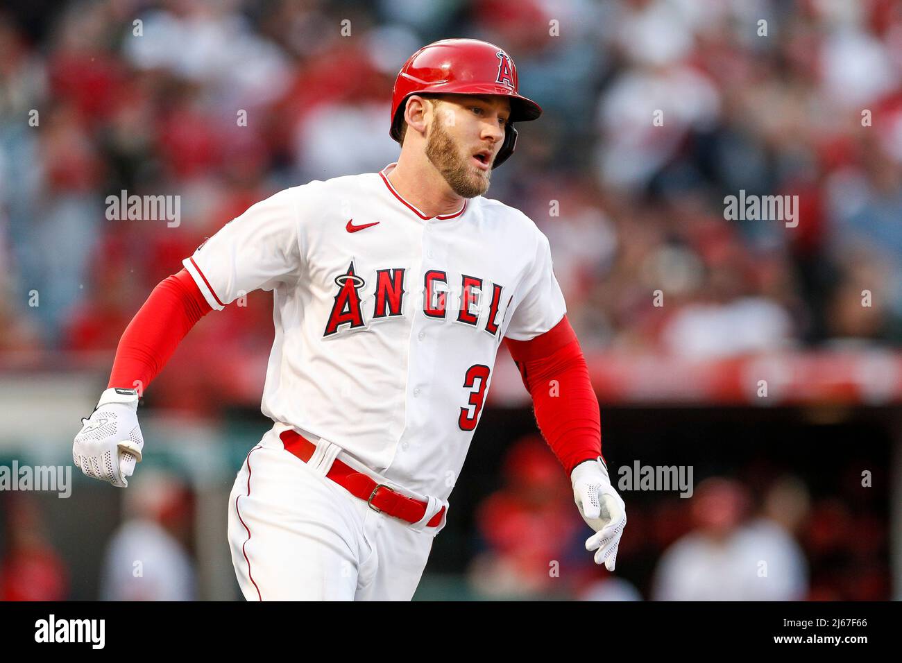 Los Angeles Angels right fielder Taylor Ward (3) runs to first base ...