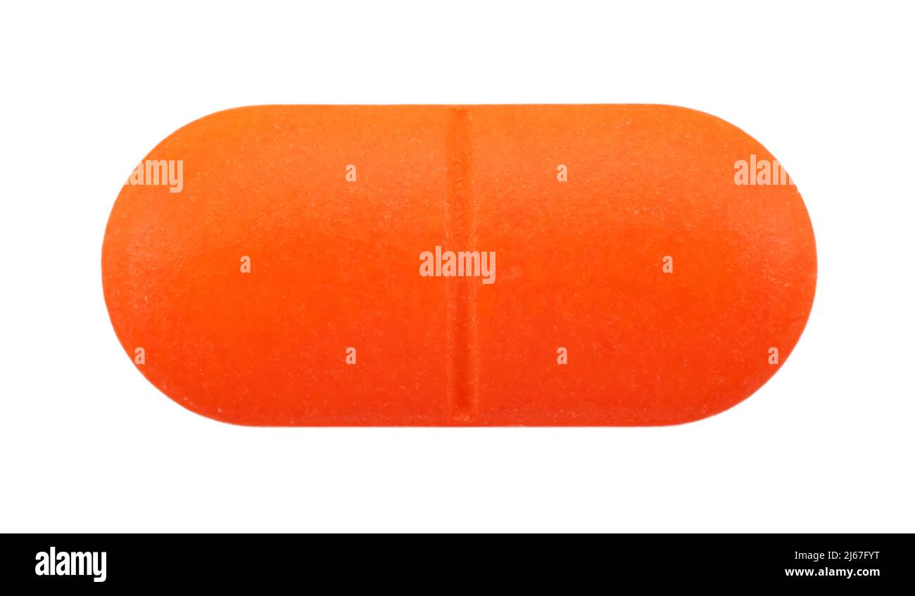 Medical pill of orange color on a white background. Medicines ...