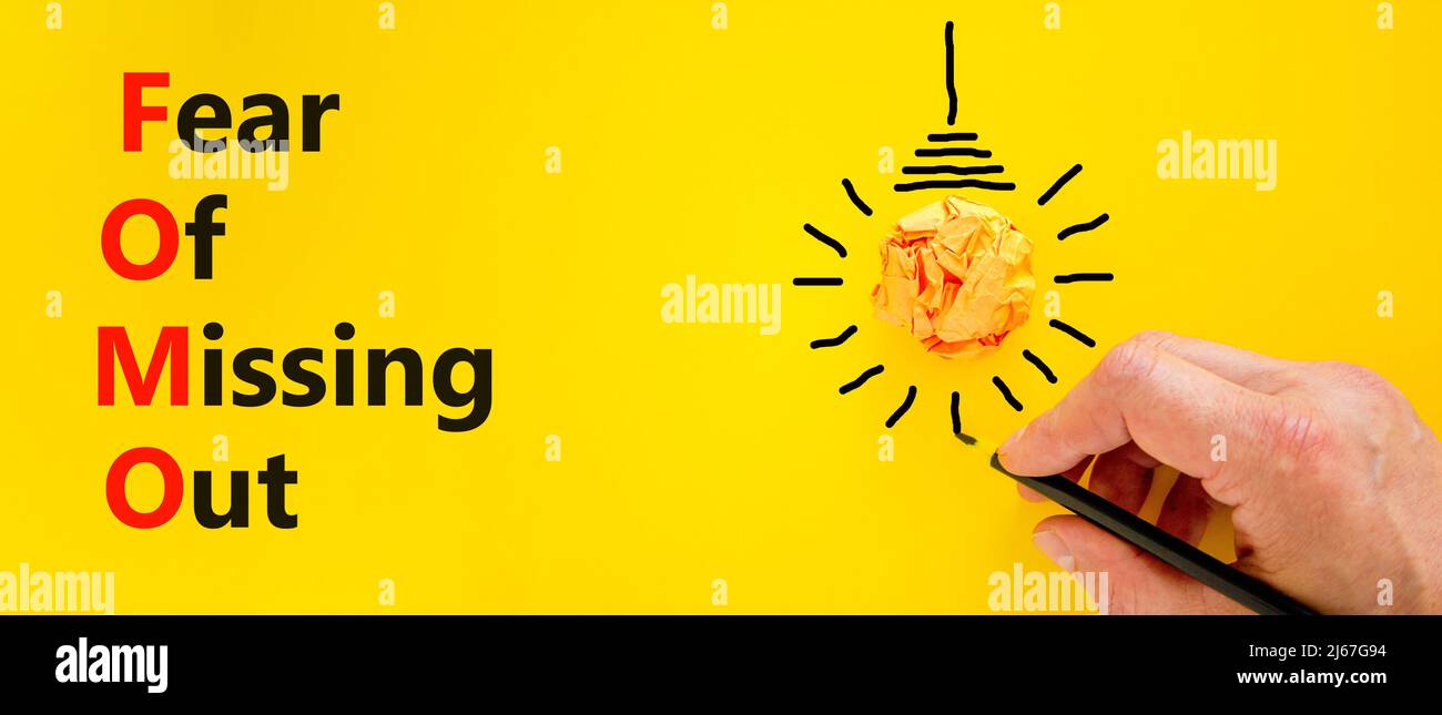 FOMO fear of missing out symbol. Concept words FOMO fear of missing out ...