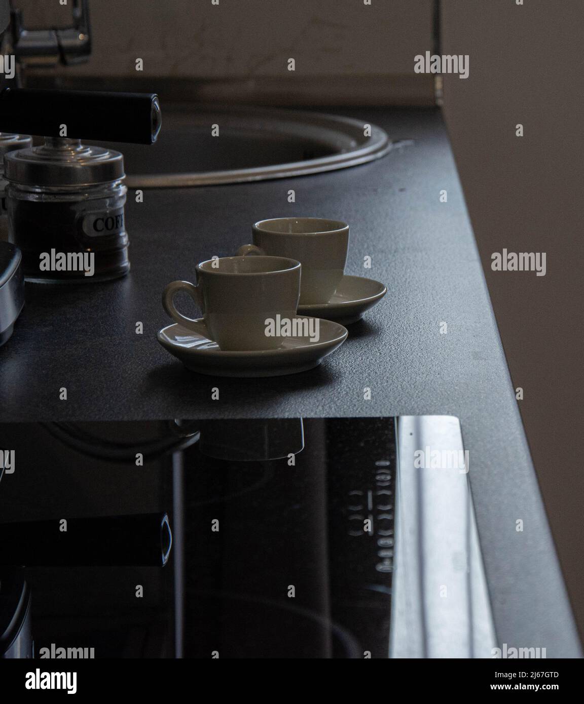 Brewing coffee in professional machine closeup Stock Photo - Alamy